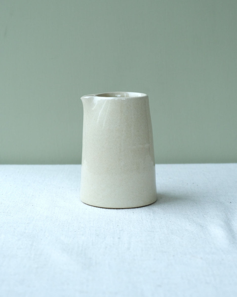 Ceramic milk jug with buttermilk glaze, made by Sophia McEvoy – Land Tales